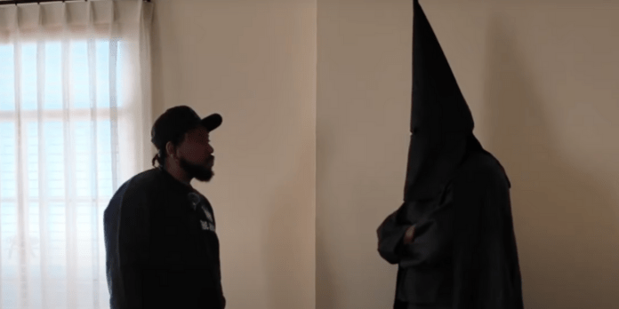 Kanye West Gives Interview in a Black KKK-Inspired Outfit | Headline USA