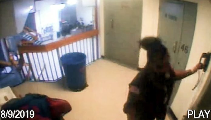 Unknown Third Person Seen in Epstein’s Final Night Video | Headline USA Unknown Third Person Seen in Epstein’s Final Night Video | Headline USA